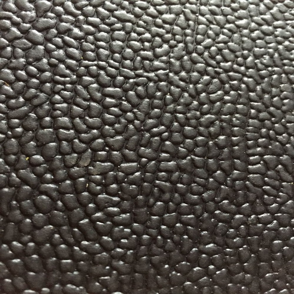 Tikar karet pola kulit jeruk